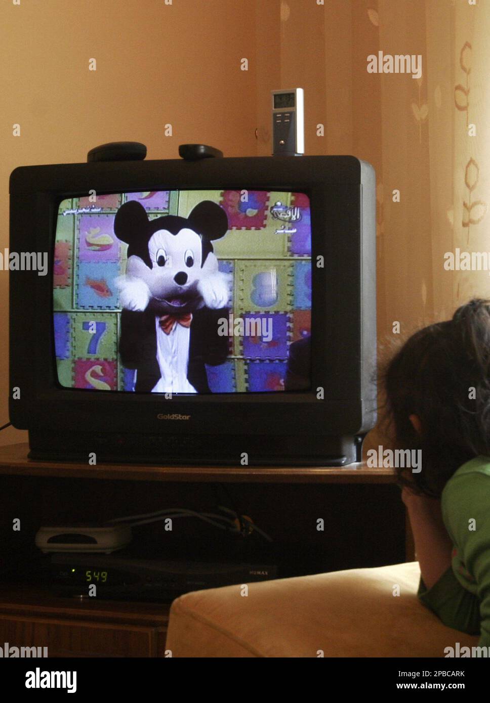 **FILE** A Palestinian girl watches Al-Aqsa TV, a station run by Hamas ...