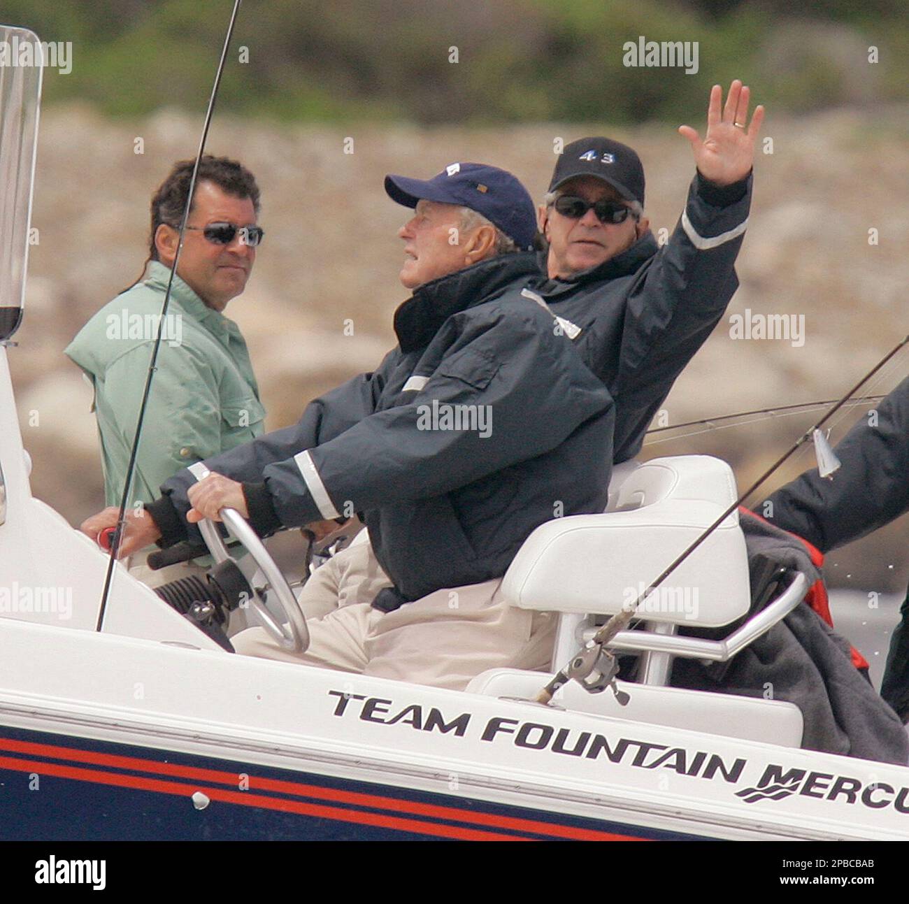 President Bush, right, waves as he father, former President George H.W ...