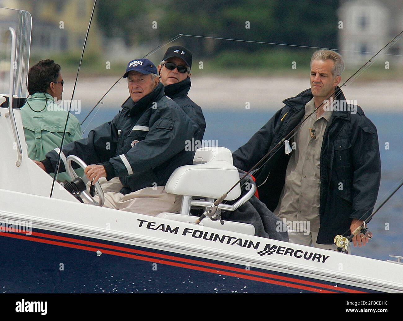 President George W. Bush, second from right, and his father, former ...