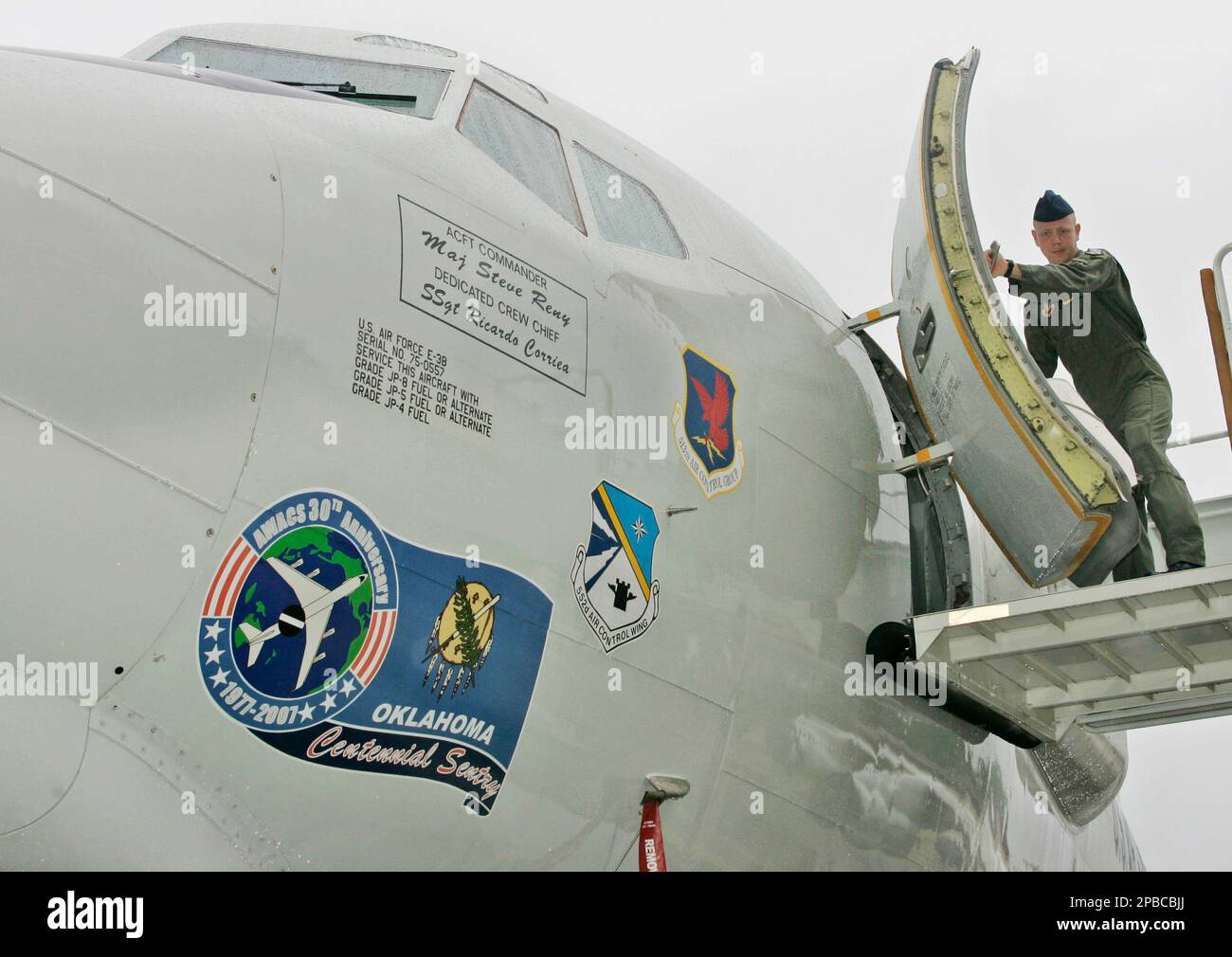 U.S. Air Force Senior Airman Martin Walcott prepares a doorway for a ...