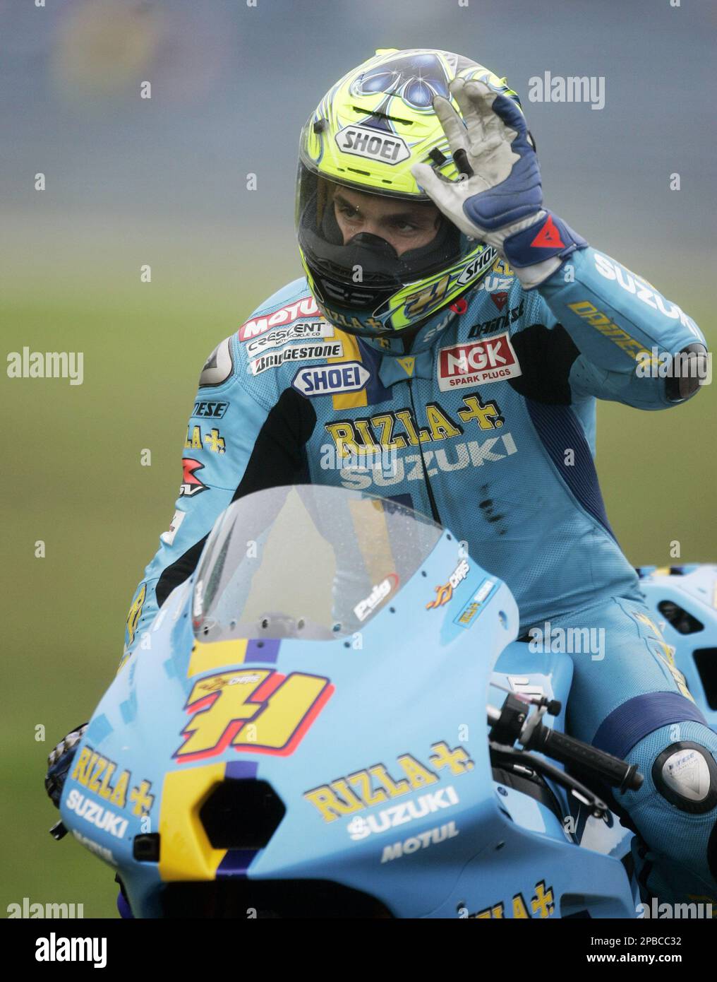 Chris Vermeulen of Australia, waves to his fans after the MotoGP ...