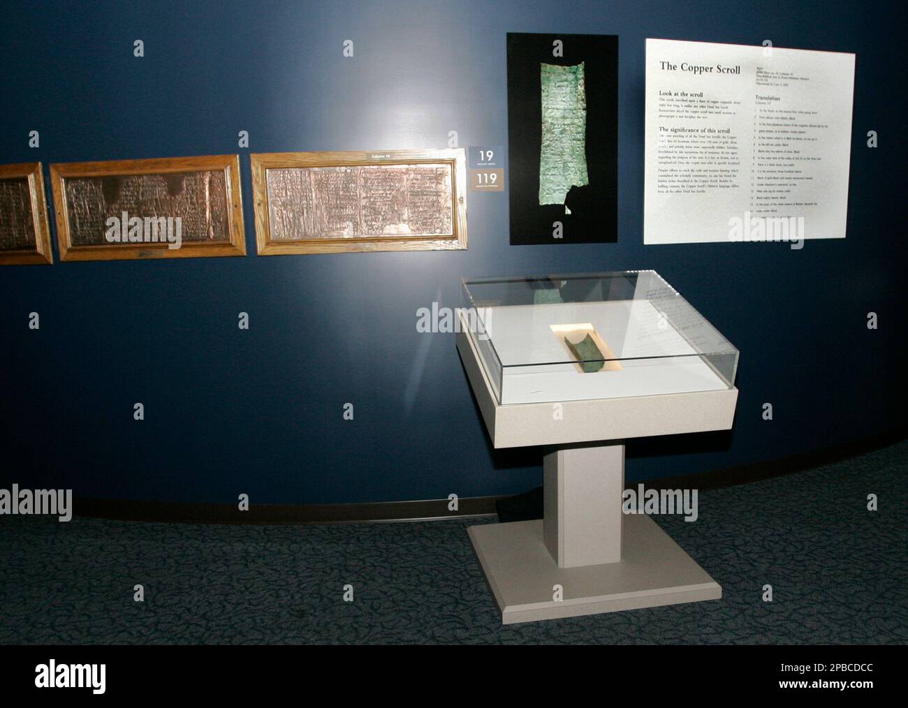The copper Dead Sea Scroll, foreground, and copper copies are seen ...