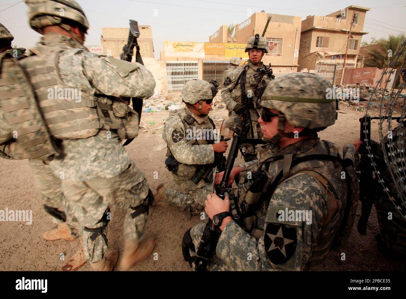 U.S. soldiers from Alpha Company, 2nd Battalion, 3rd Infantry Regiment ...