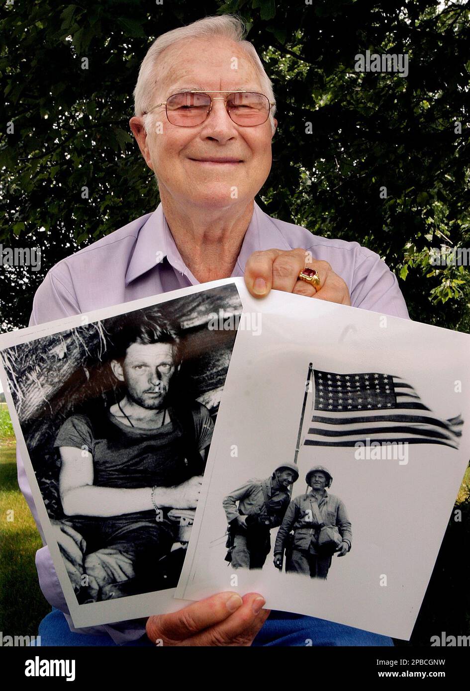 Billy Genaust shows off two of his favorite photos of his great uncle ...