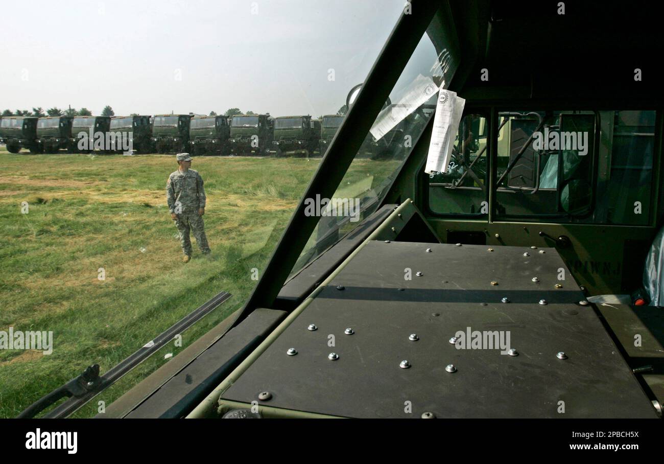 A line-up of new Light Medium Tactical Vehicle (LMTV) trucks can be ...