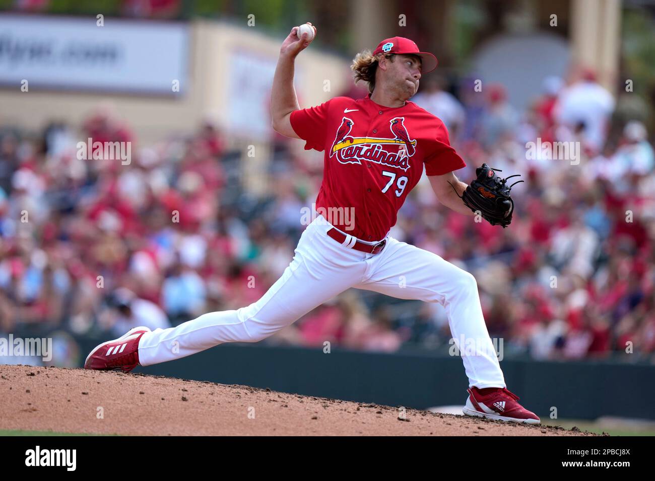St. Louis Cardinals relief pitcher Kyle Leahy throws during a spring training baseball game ...