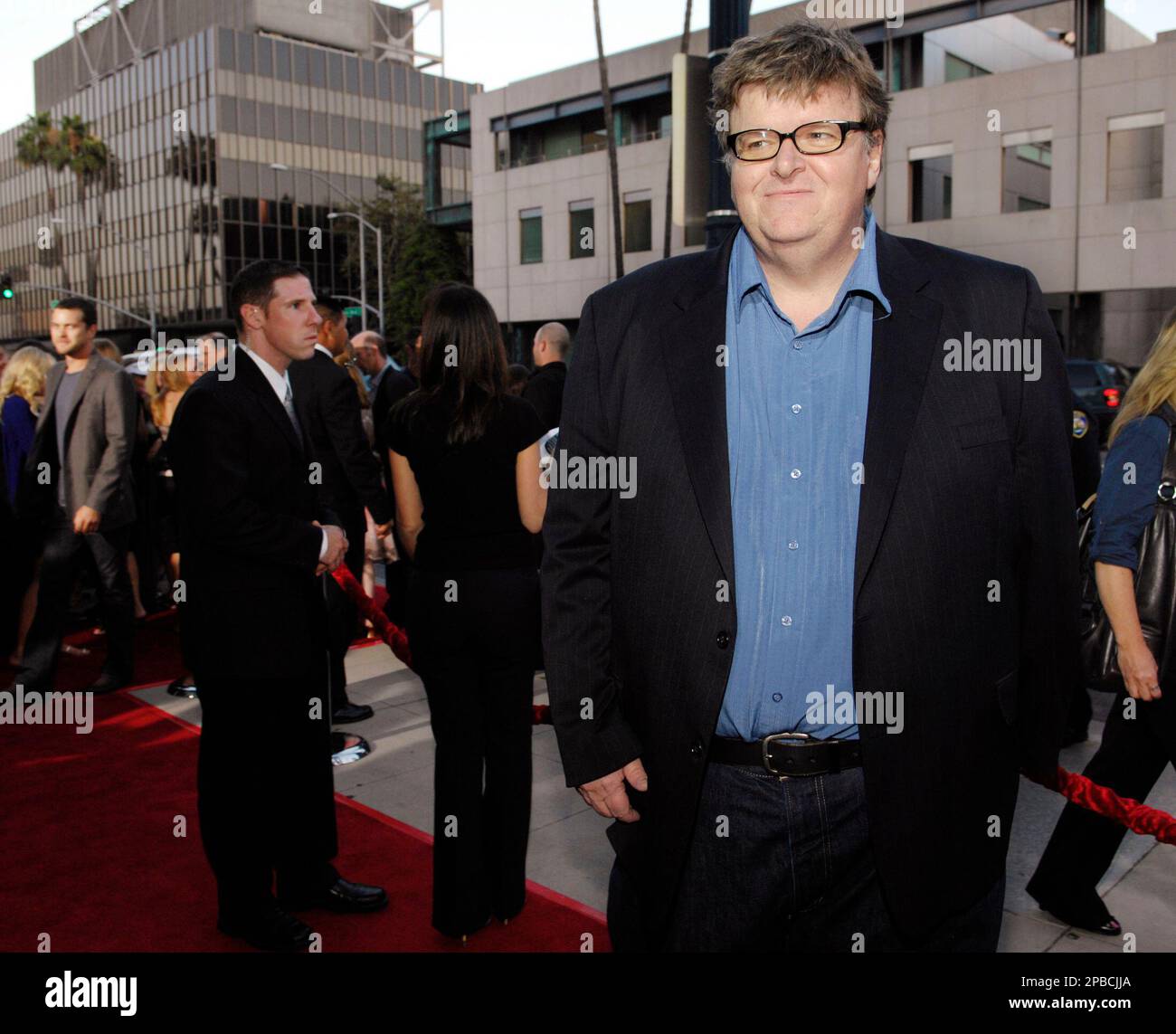 "Sicko" director Michael Moore arrives at a special screening of the ...
