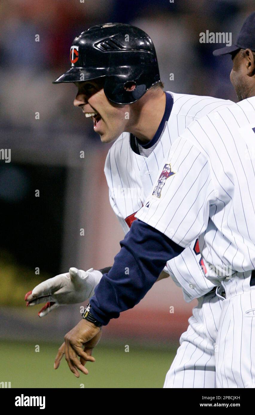Minnesota Twins pinch hitter Jeff Cirillo smiles after his 12th-inning ...
