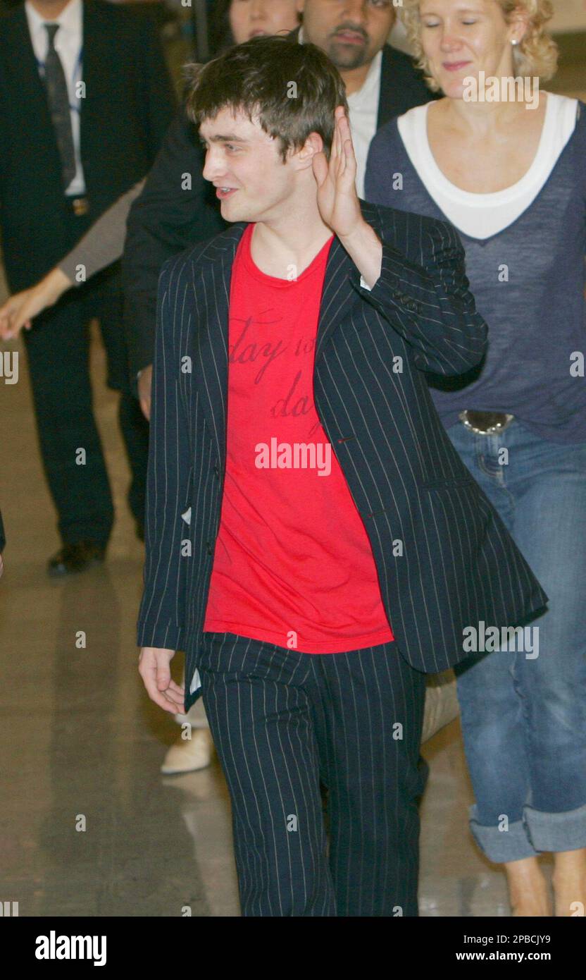 Actor Daniel Radcliffe is welcomed by Japanese fans upon his arrival at ...