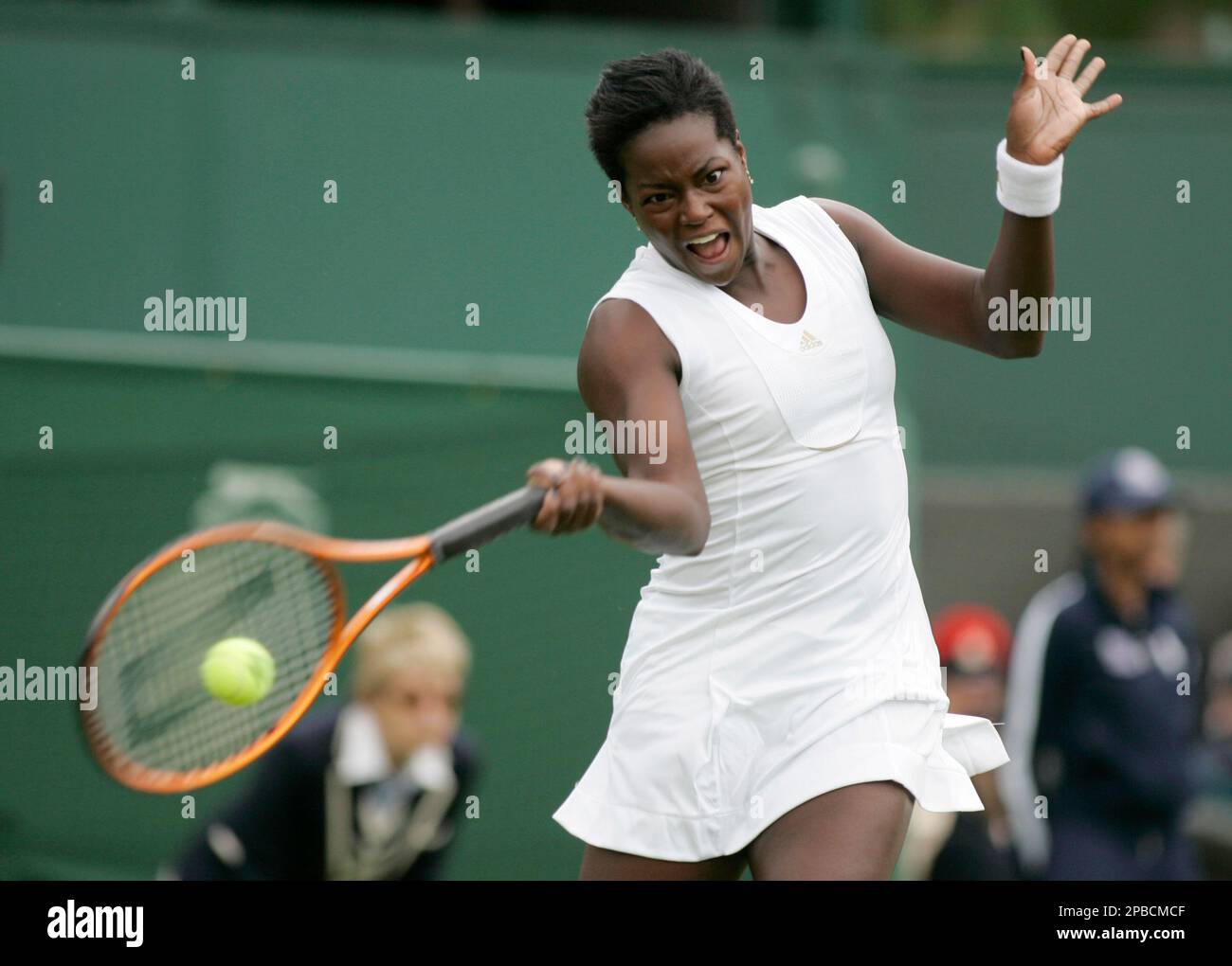 Jamea Jackson of the US returns a shot from defending champion Amelie ...