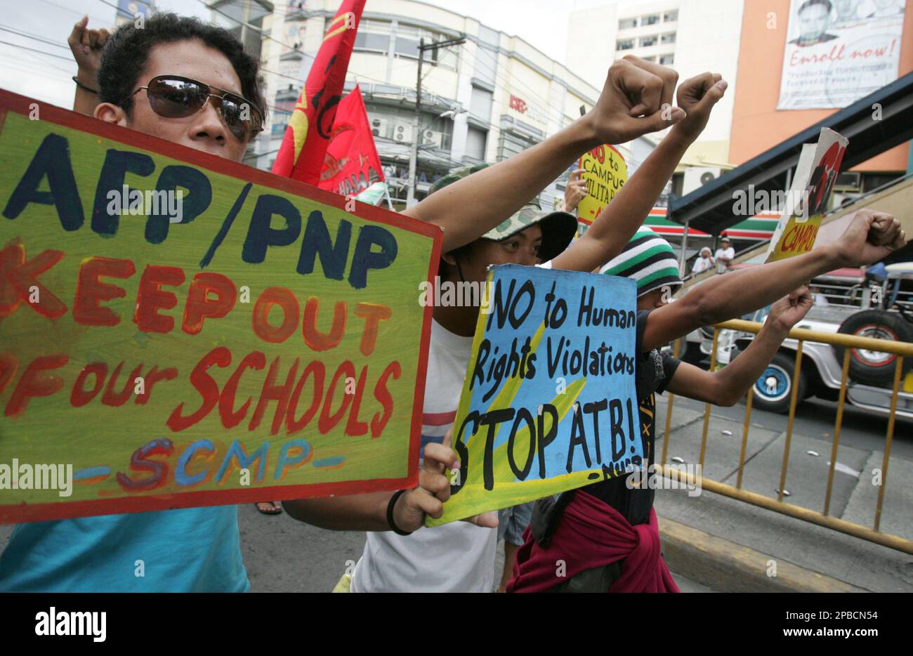 Student in clenched fists, march towards the Presidential Palace in ...