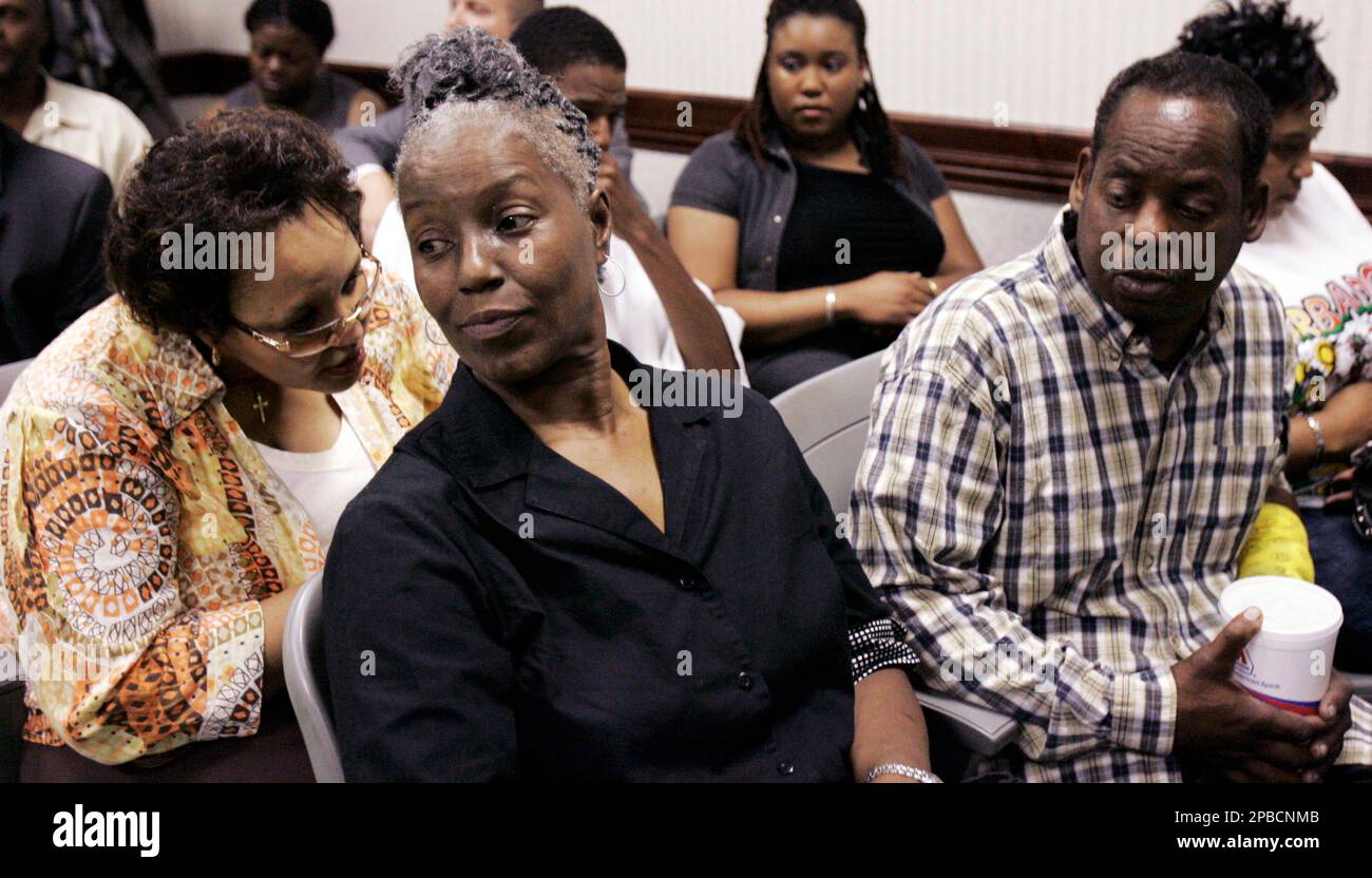 Bobby Cutts Jr.'s uncle, name unavailable, and two unidentified women ...