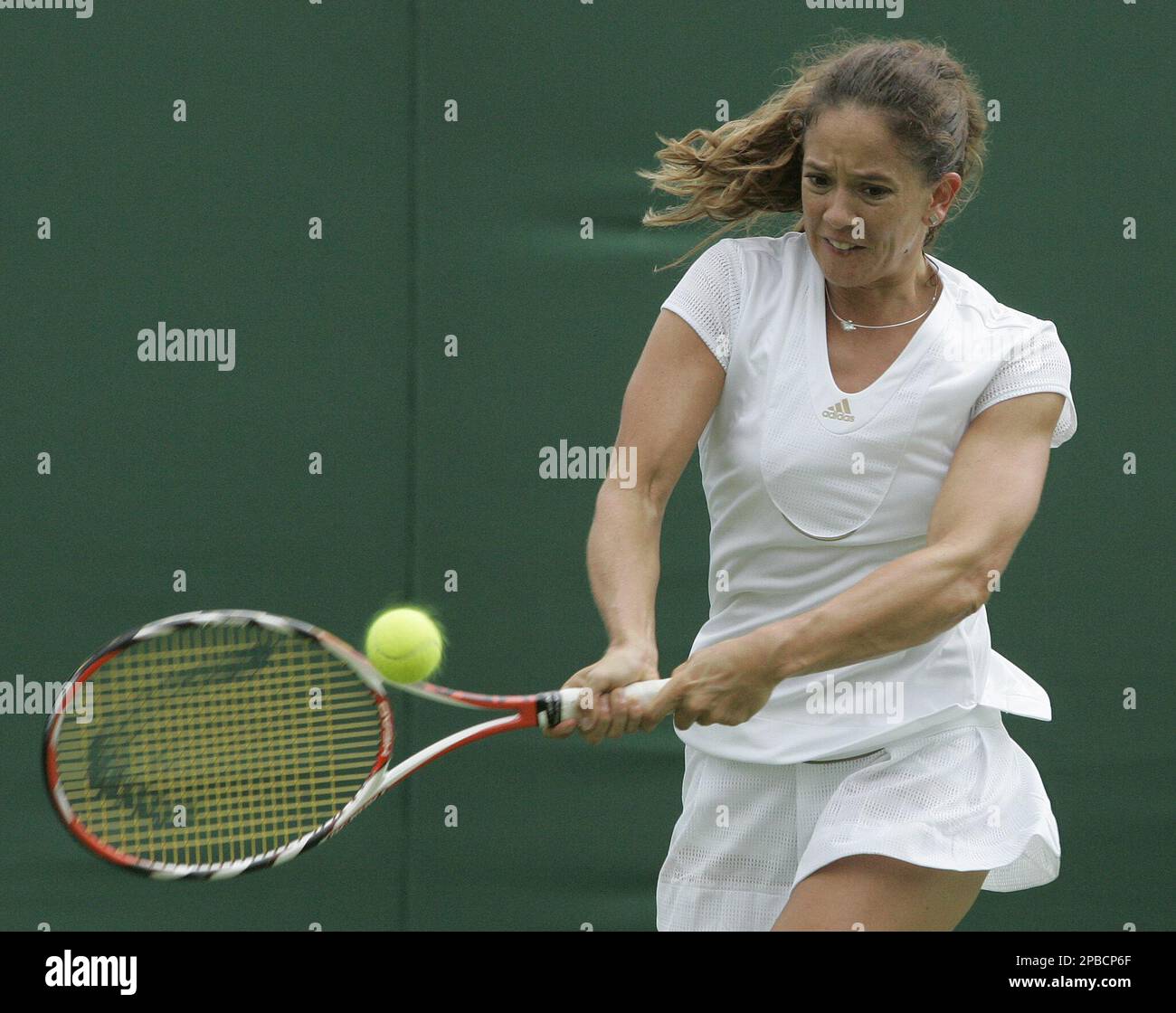 Switzerland's Patty Schnyder plays a return to Camille Pin of France ...