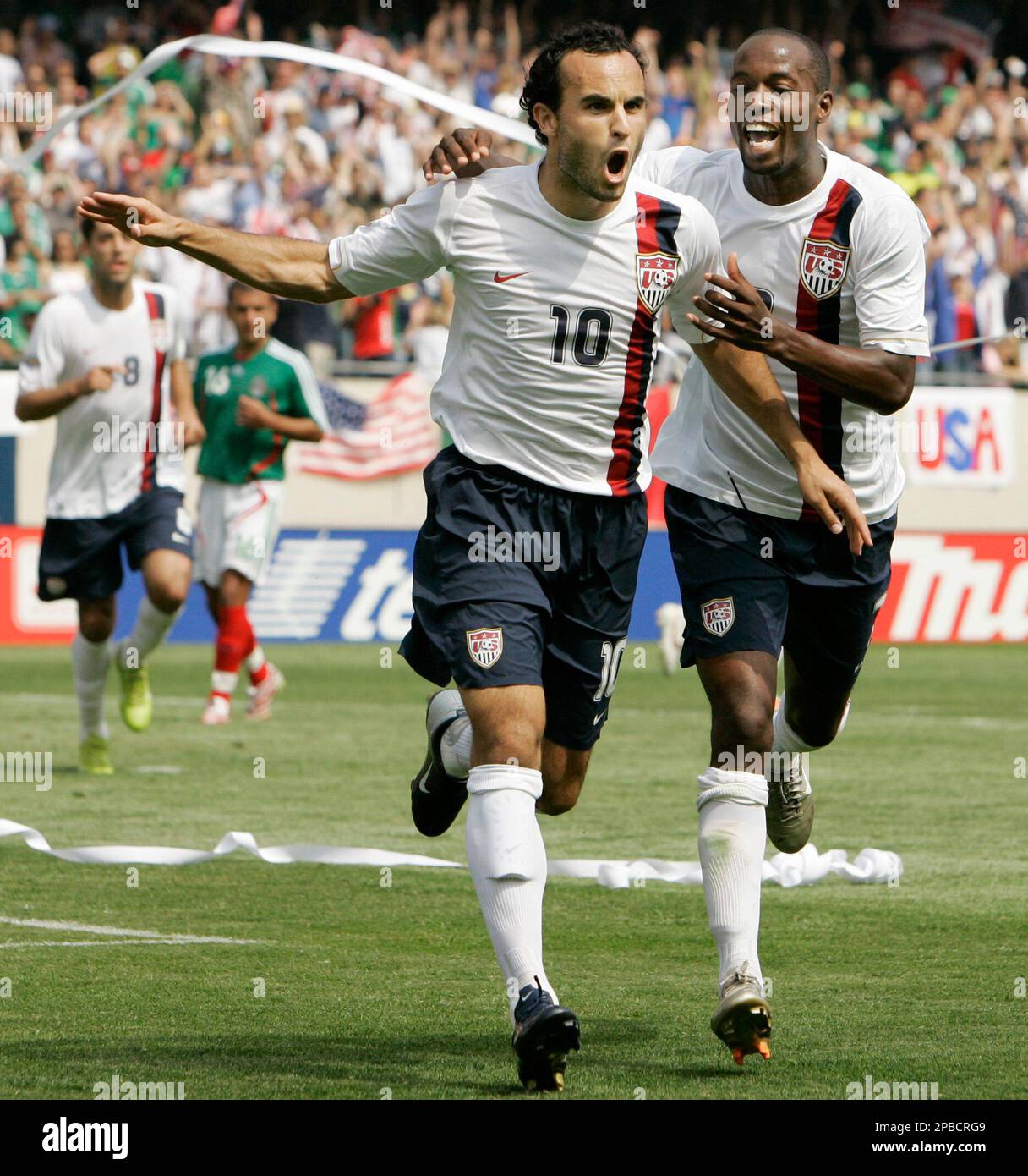 USA's Landon Donovan, left, celebrates with DaMarcus Beasley after ...