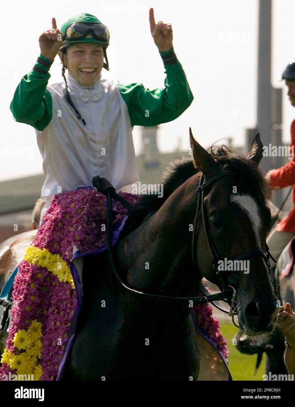 Jockey Emma Jayne Wilson celebrates aboard Mike Fox after winning the ...