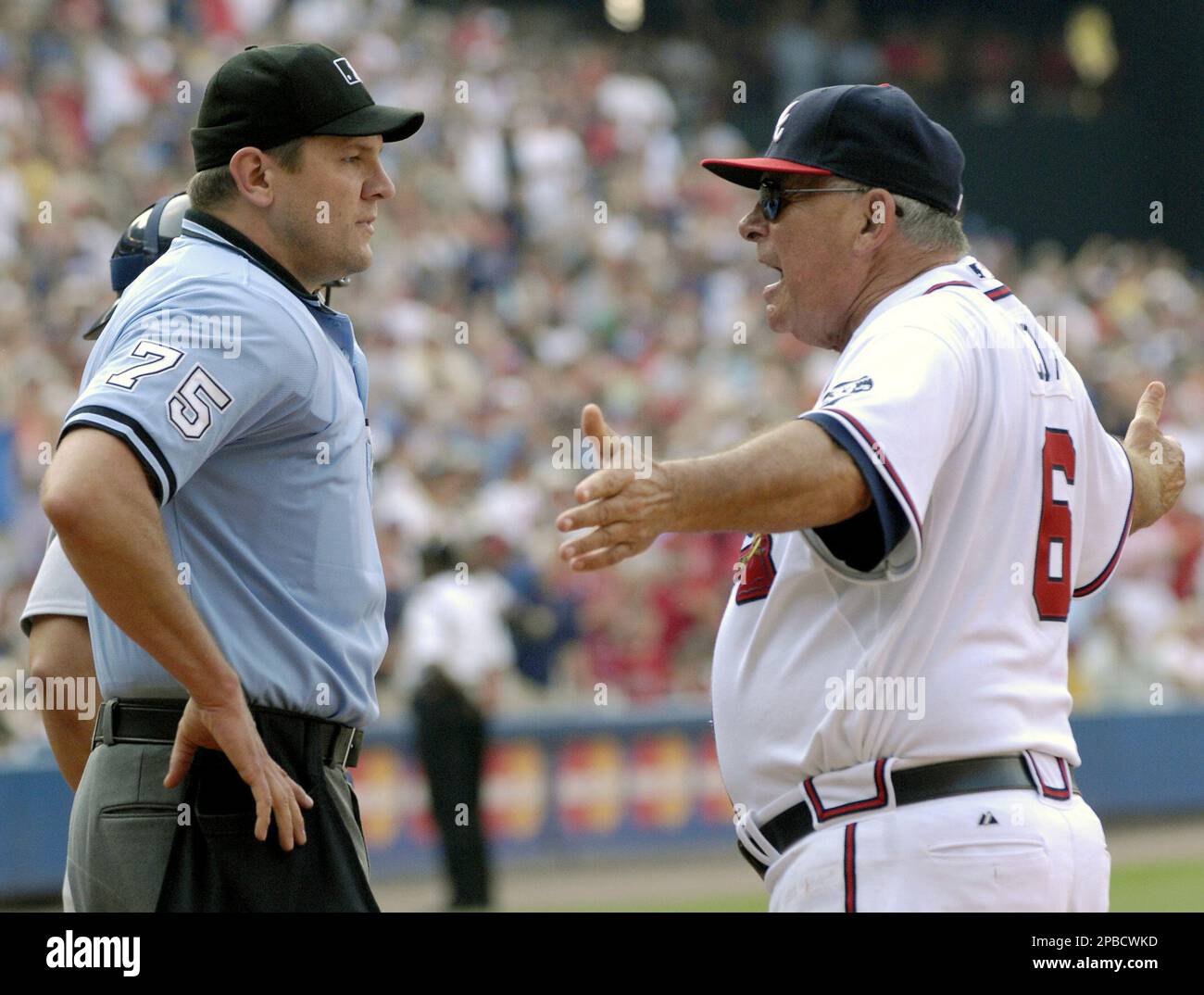 Atlanta Braves manager Bobby Cox, right, argues with home plate umpire ...
