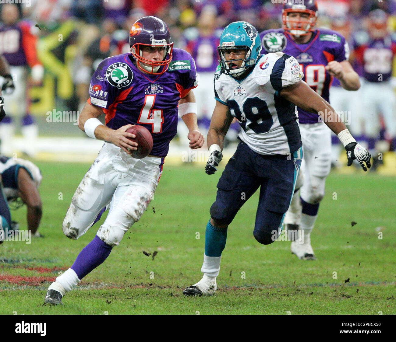 Quarterback J.T. O'Sullivan of Frankfurt Galaxy, left, and Ben Ishola ...