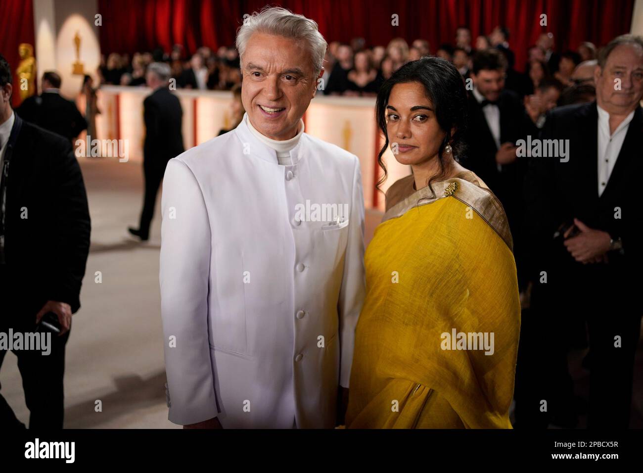 David Byrne, left, and Mala Gaonkar arrive at the Oscars on Sunday ...