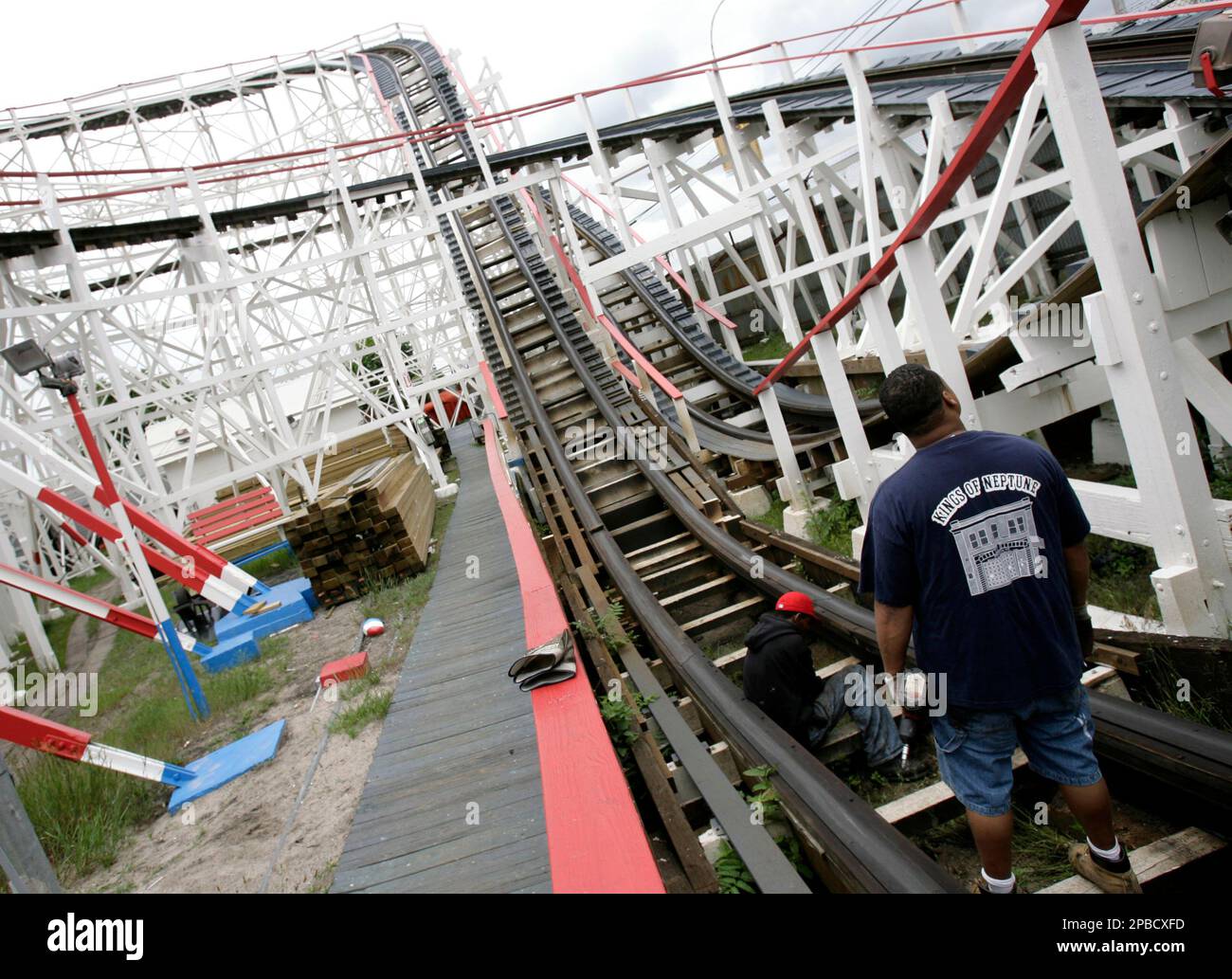 Jhomar Bennett, right, and Nathaniel Hudson walk the track of the ...
