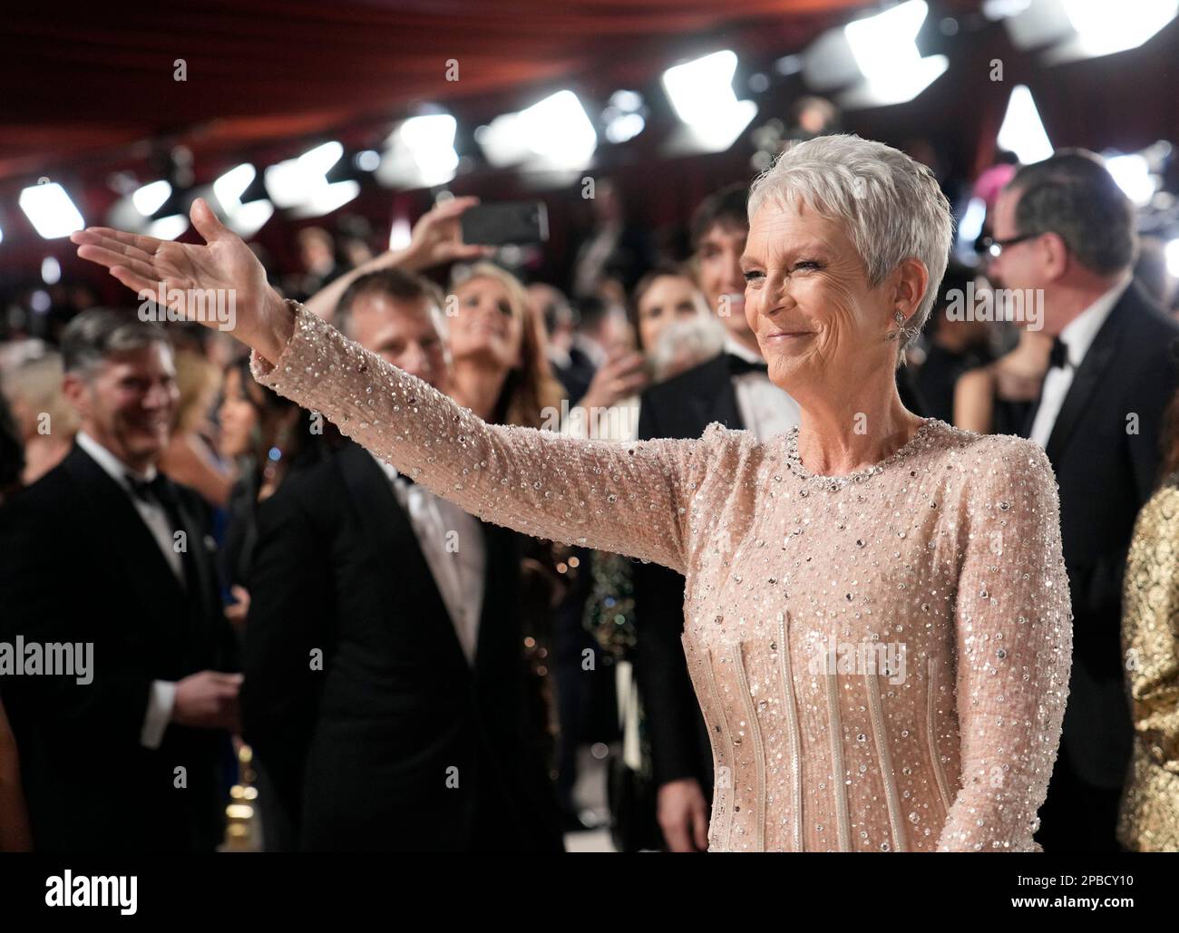 Jamie Lee Curtis arrives at the Oscars on Sunday, March 12, 2023, at ...