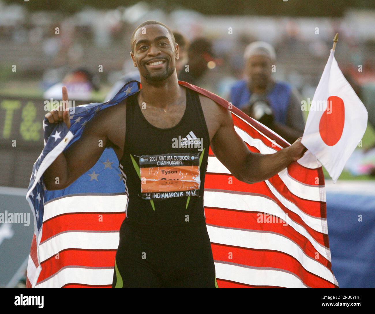 Tyson Gay poses after winning the men's 100-meter dash in a time of 9. ...