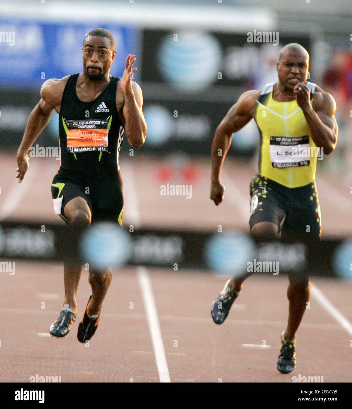 Tyson Gay, left, outruns Leonard Scott to win the men's 100-meter dash ...