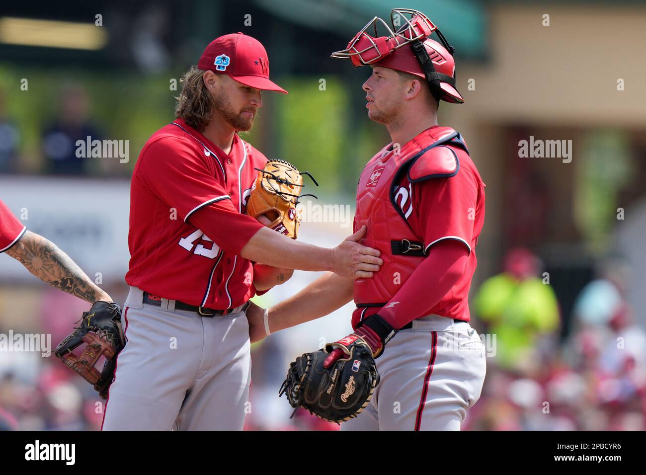 Washington Nationals relief pitcher Hobie Harris, left, stands on the ...