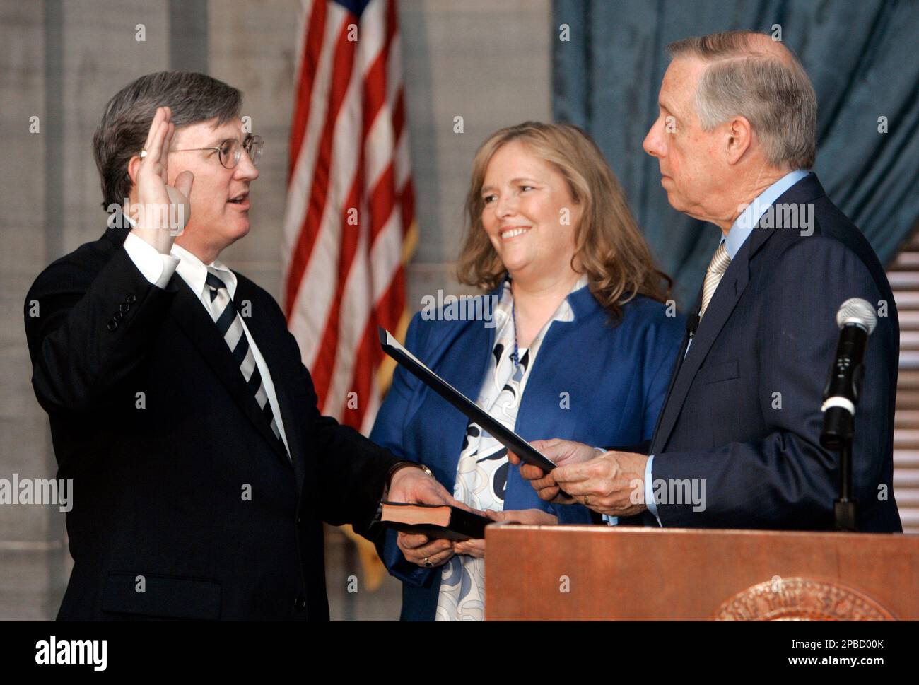 William Koch, left, is sworn in by Gov. Phil Bredesen as a justice on ...