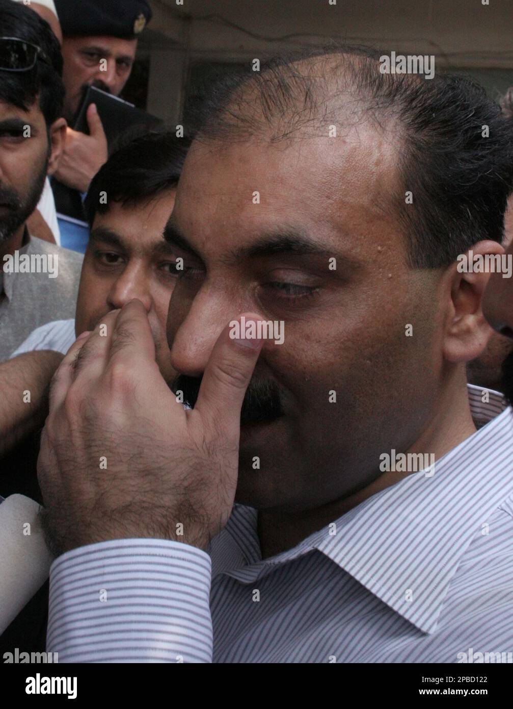 Former Pakistan government minister Shahid Jamil Qureshi talks to media ...