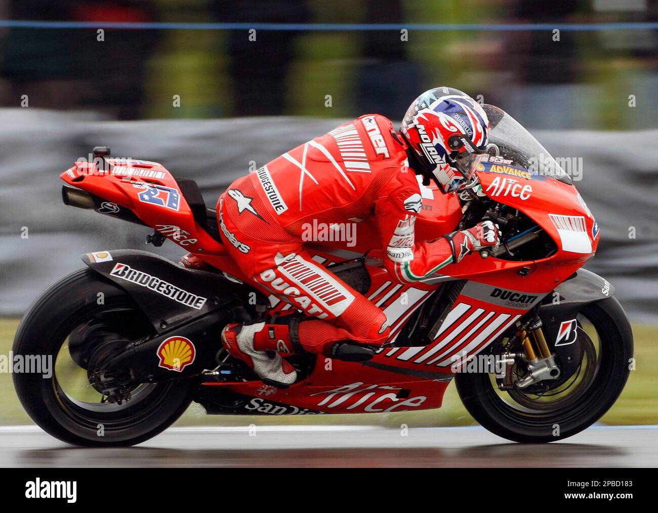 Australian MotoGP class motorcycle pilot Casey Stoner rides his Ducati ...