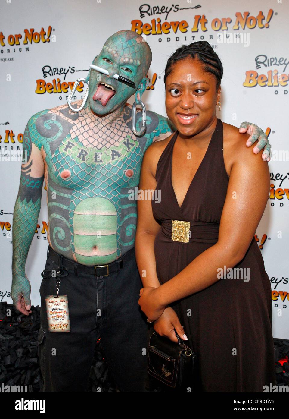 Erik "The Lizardman" Sprague, left, poses with Jalisa "The Eyepopper ...