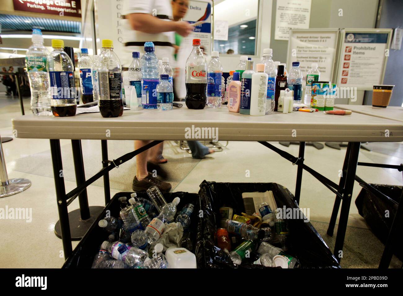 Prohibited items are seen near a security checkpoint in the ...