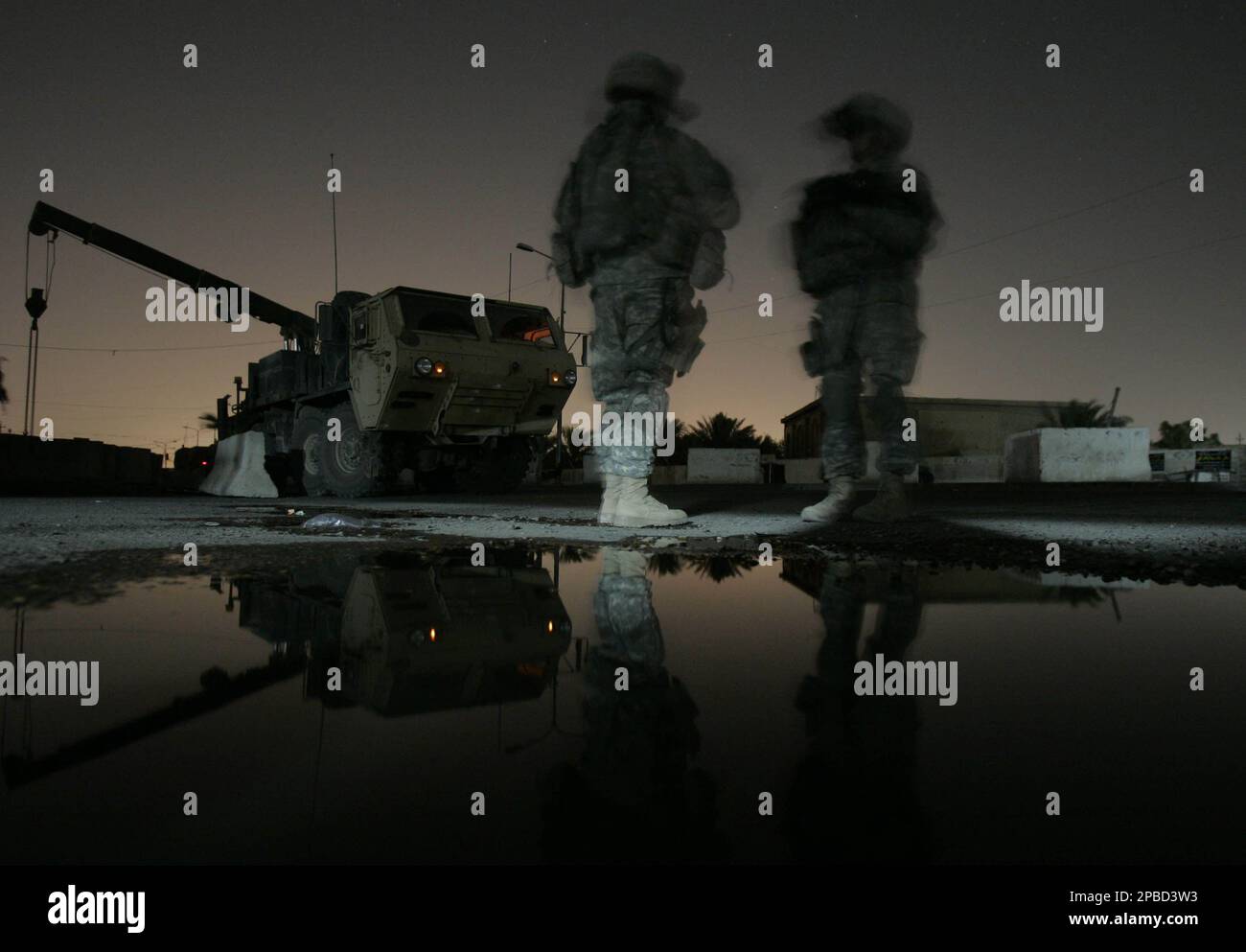 Soldiers of the 2nd brigade, 23rd infantry regiment, stand guard in ...