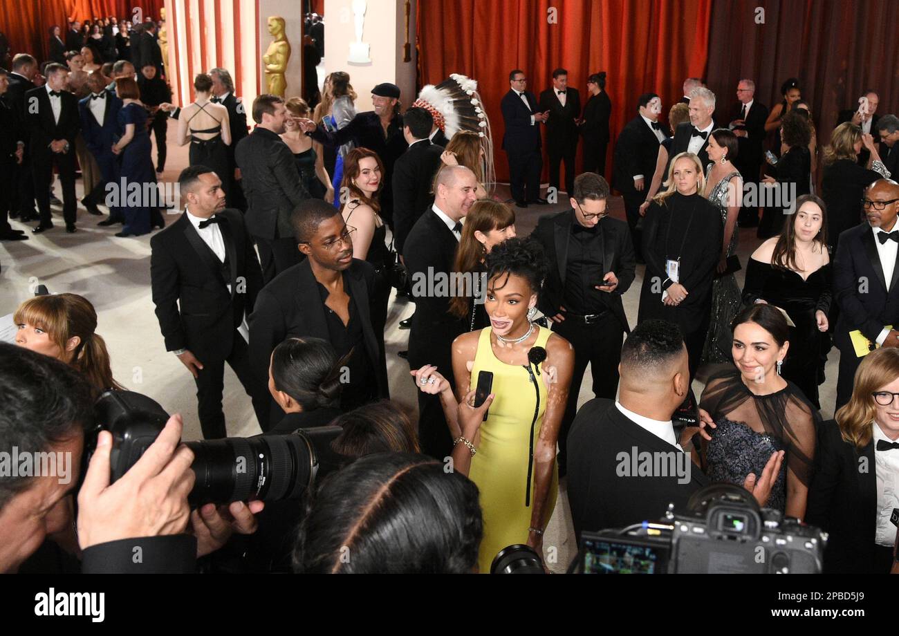 Winnie Harlow, center, speaks with the press on the carpet at the ...