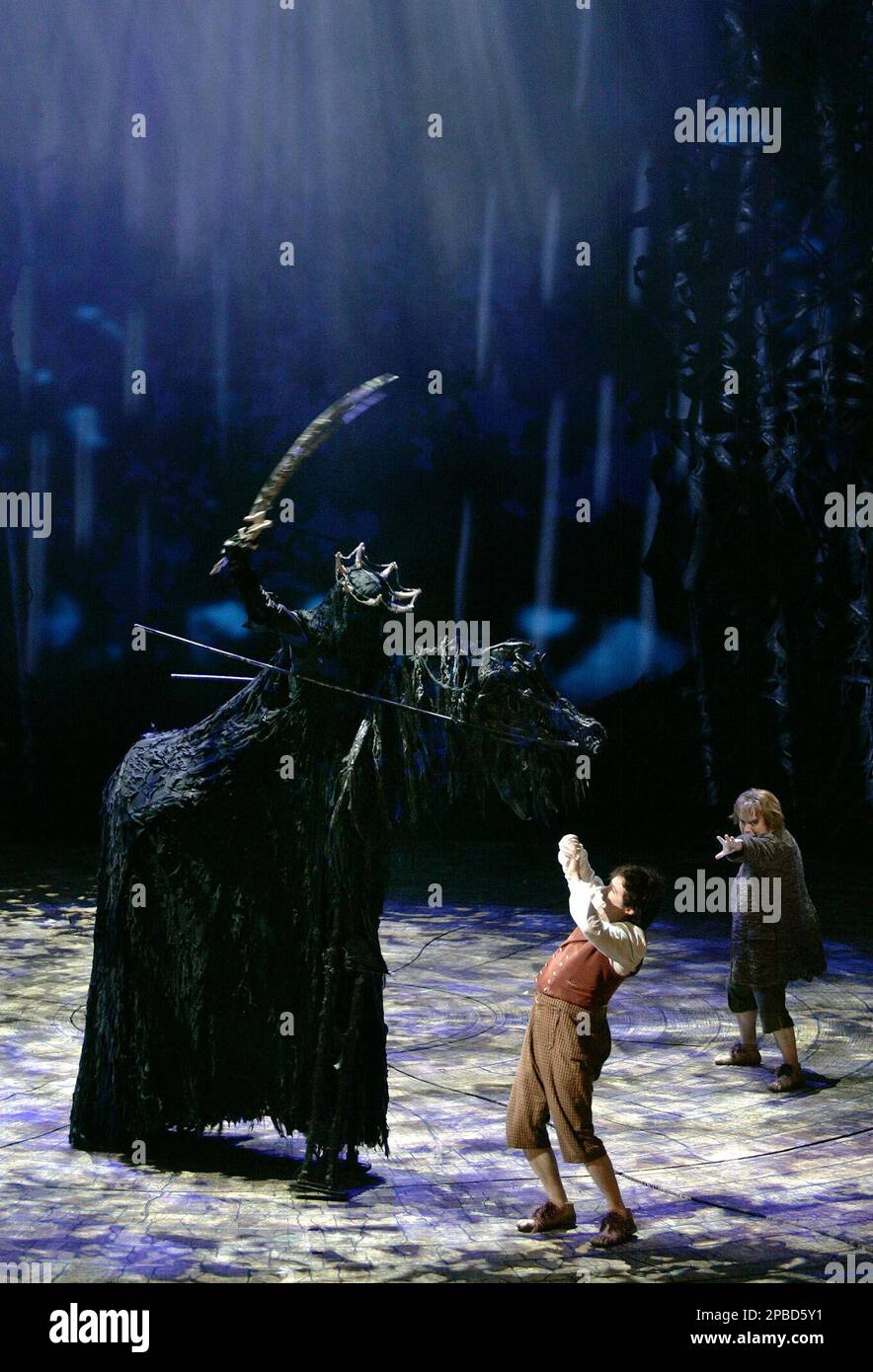 James Loye as 'Frodo', centre, Peter Howe as 'Sam', right, and David ...