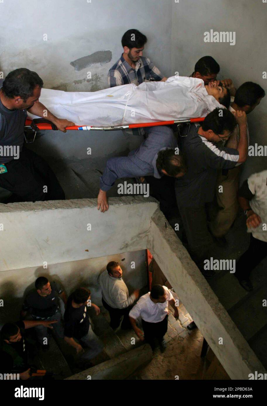 Palestinians carry the body of militant Ahmad Al Abdullah, who was ...