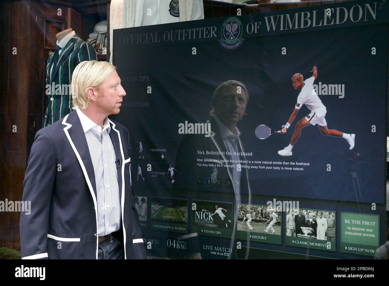 Former Wimbledon Champion Boris Becker watches the screen during a ...