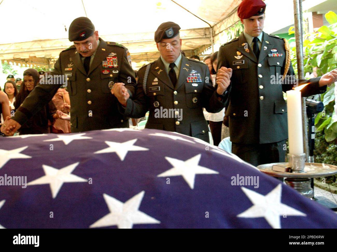Honor Guards from the 8th U.S. Army Korea hold hands in front of the ...