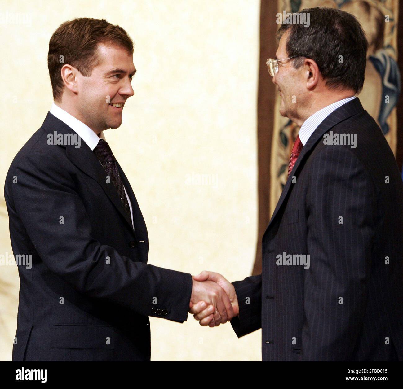 Russia's Deputy Prime minister Dimitry Medvedev, left, shakes hands ...