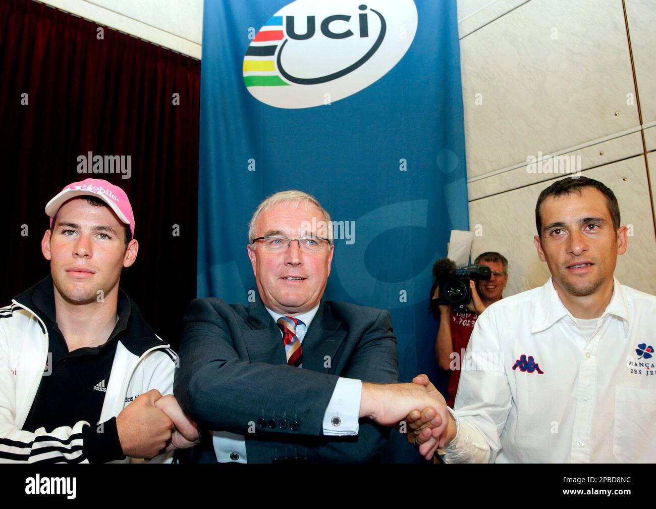Pat McQuaid from Ireland, center, president of the International ...