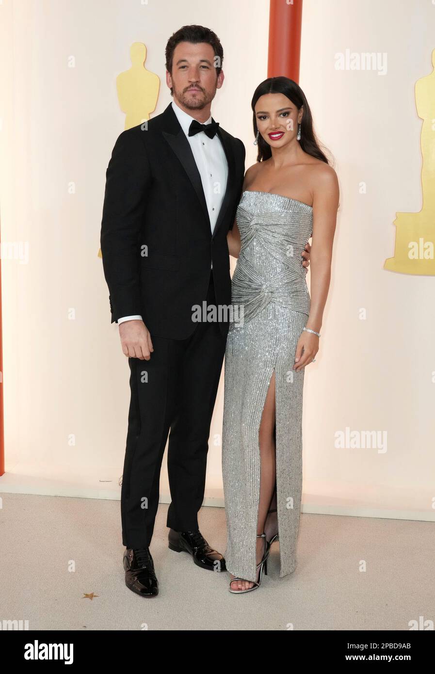 Miles Teller, left, and Keleigh Sperry arrive at the Oscars on Sunday ...