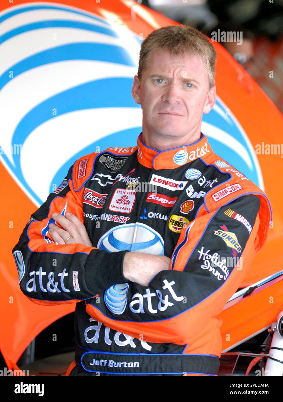 ** FILE ** NASCAR driver Burton looks out from the garage area during ...