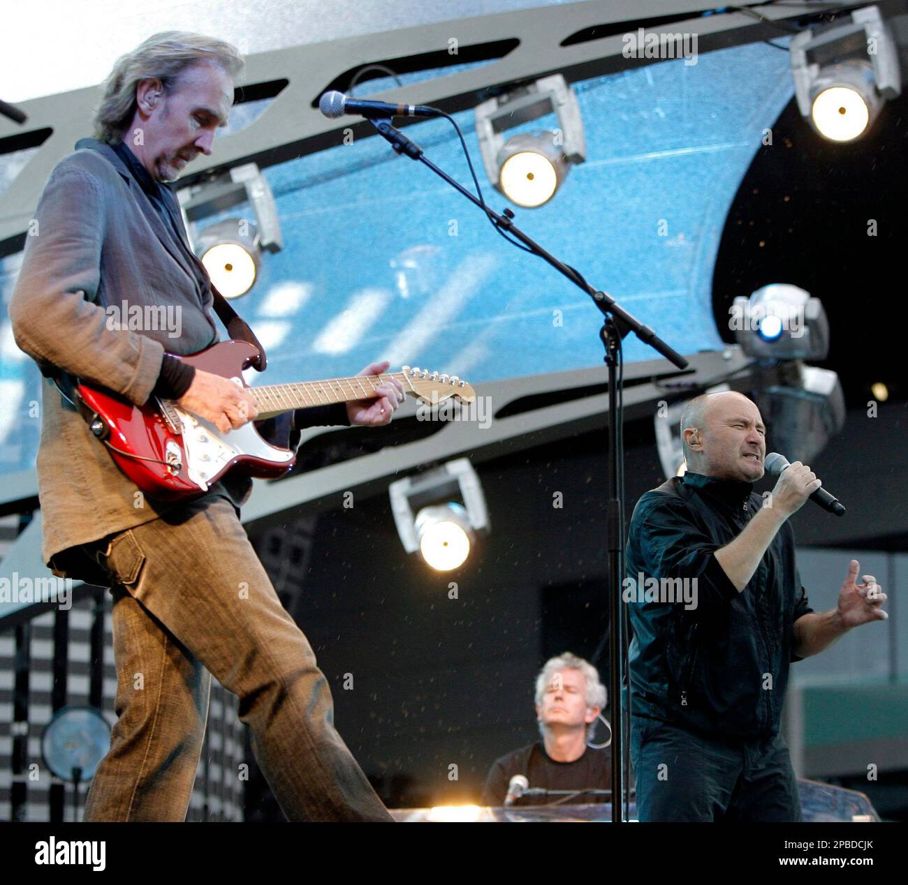 British band Genesis, with Mike Rutherford on the guitar, left, Tony Banks at the keyboard ...