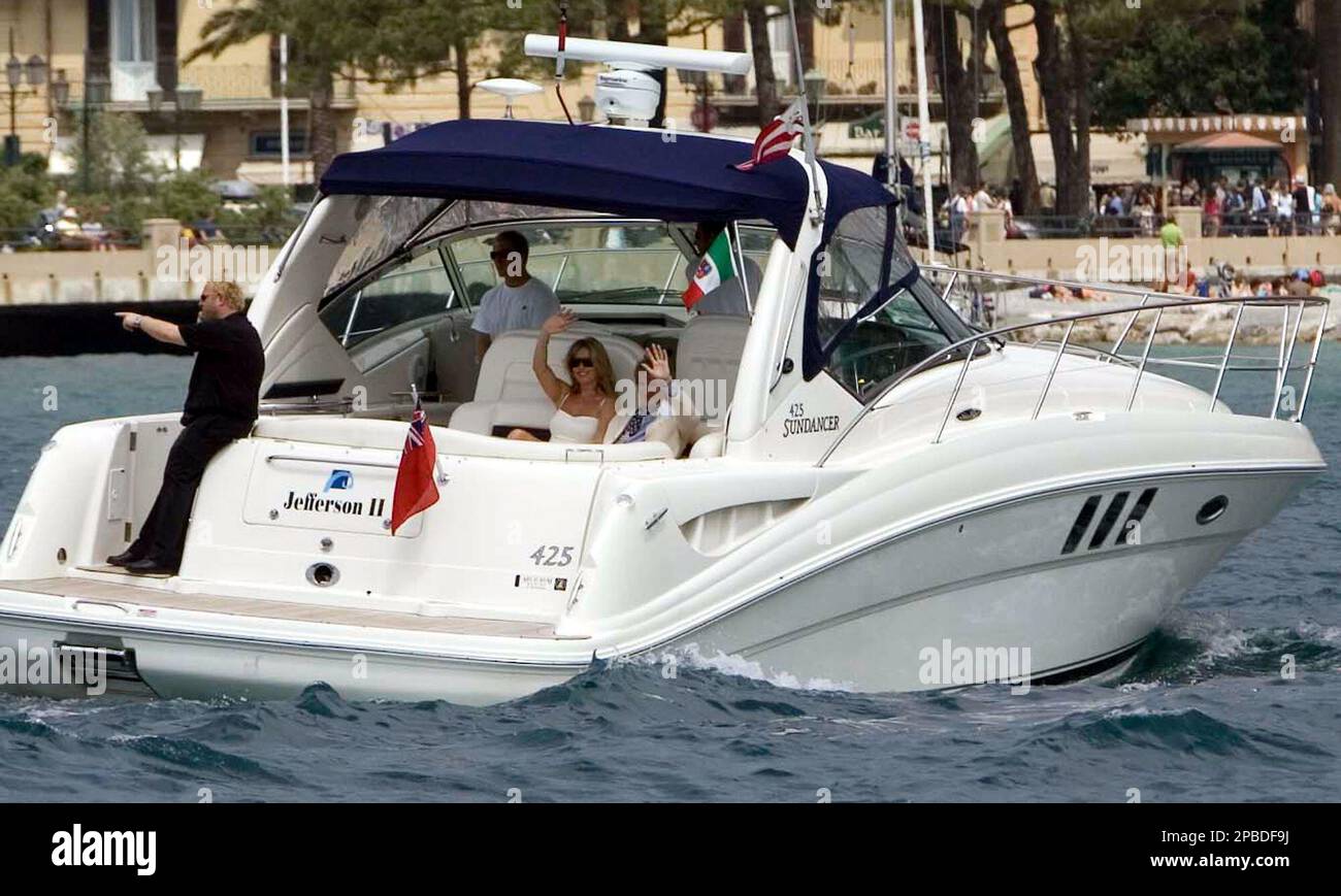 British rocker Rod Stewart and his newly wed wife model Penny Lancaster ...