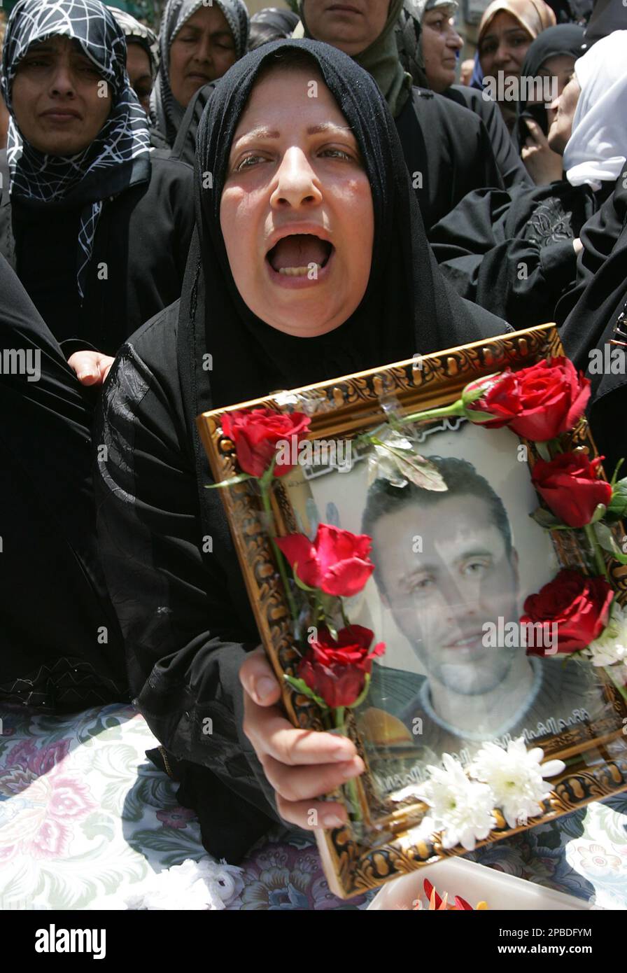 Alia, the mother of Lebanese Nejmeh Club soccer player Hussein Dokamk ...