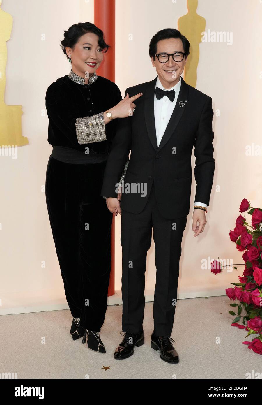 Echo Quan, left, and Ke Huy Quan arrive at the Oscars on Sunday, March ...