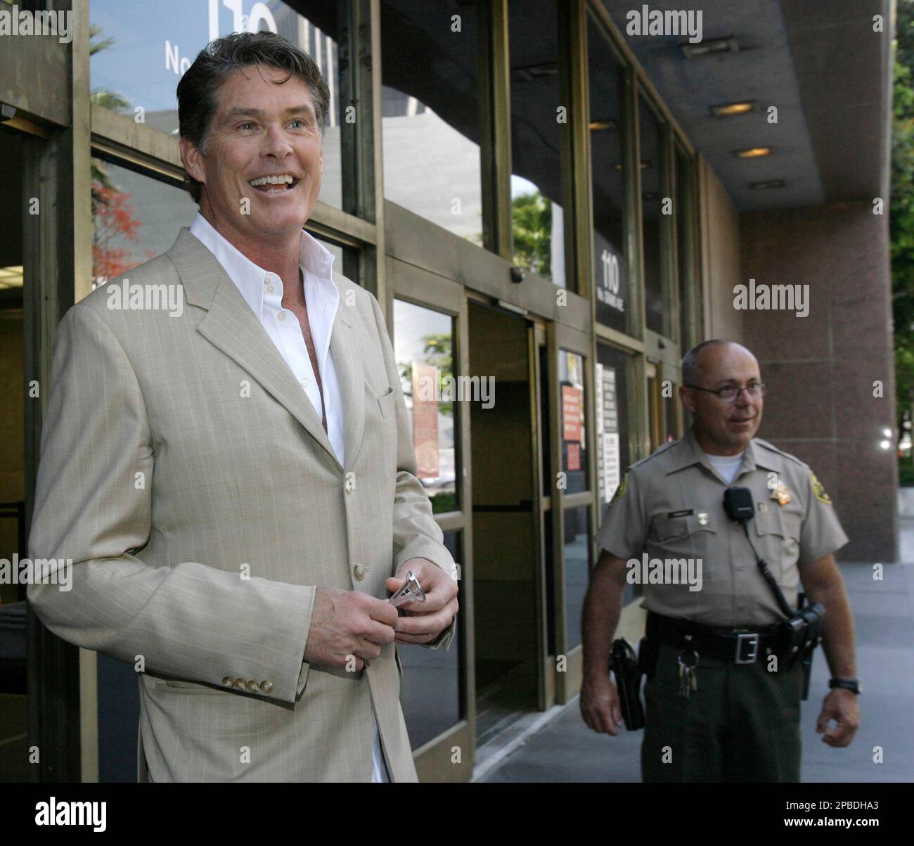 Actor David Hasselhoff smiles as he leaves court after a child custody ...