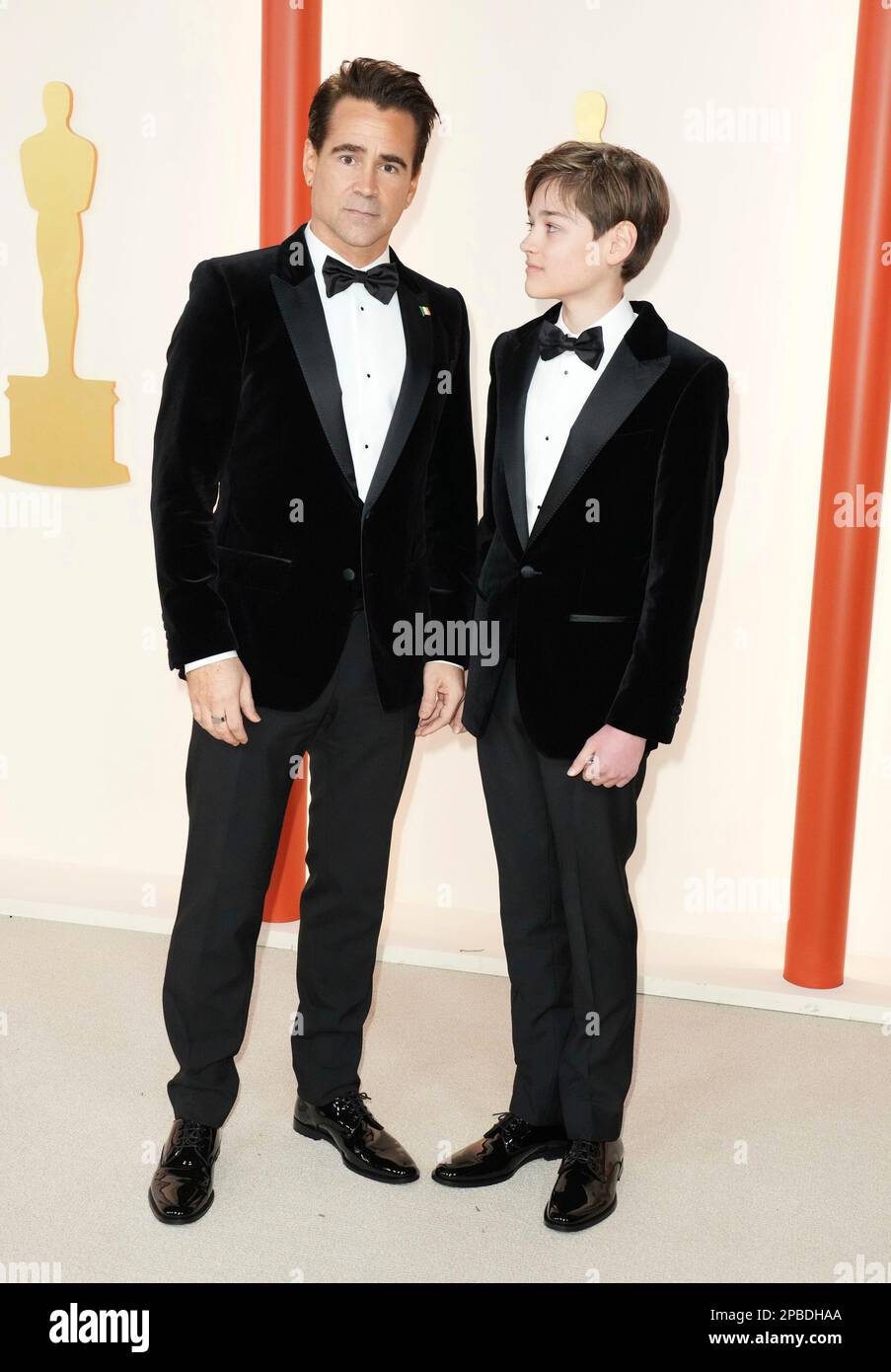 Colin Farrell, left, and Henry Tadeusz Farrell arrive at the Oscars on ...