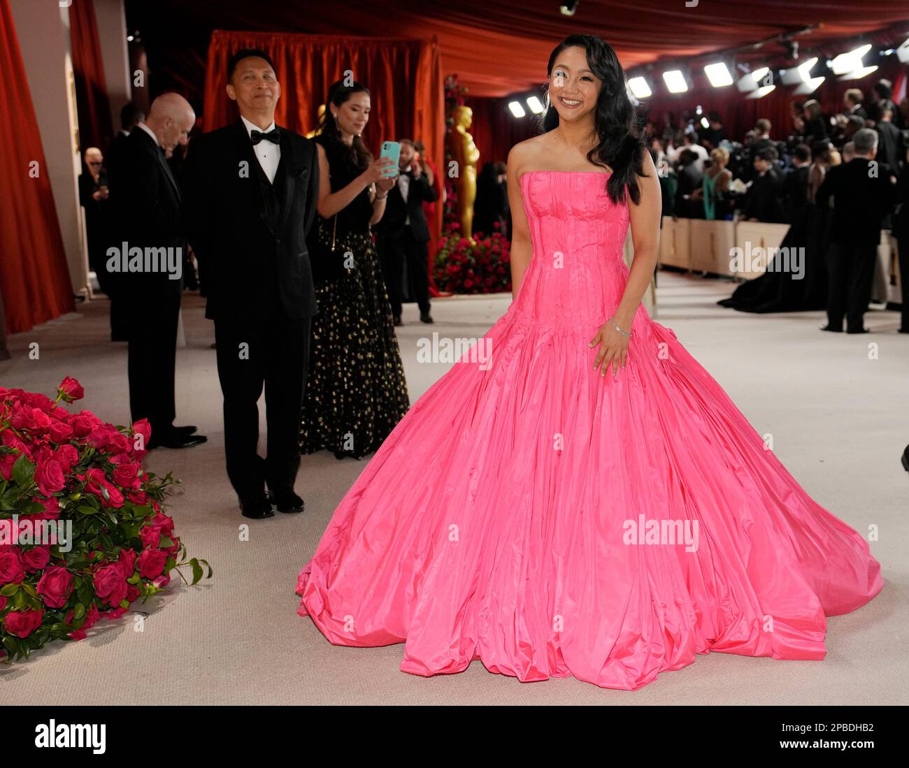 Stephanie Hsu arrives at the Oscars on Sunday, March 12, 2023, at the ...