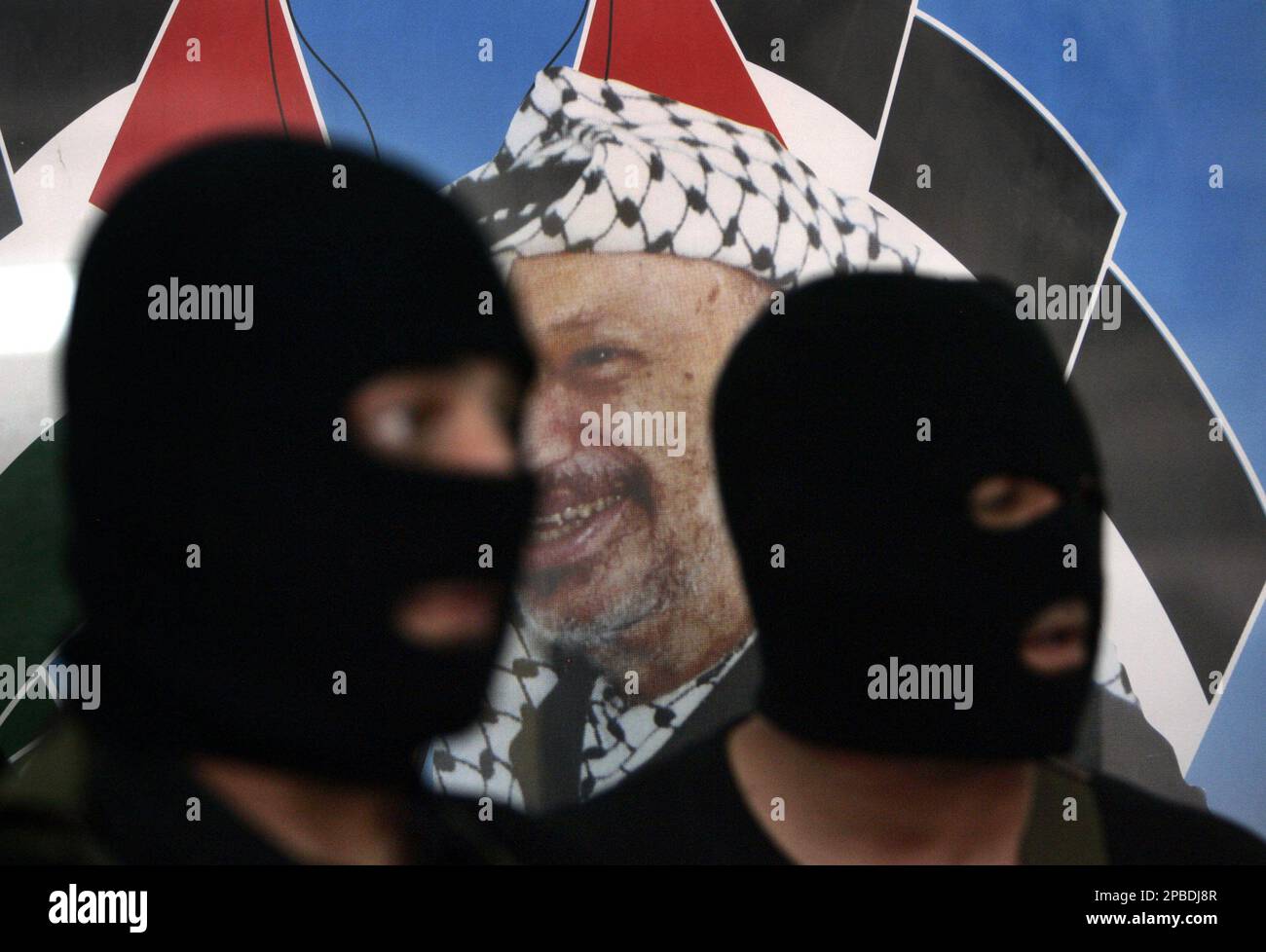 A poster of the late Yasser Arafat is seen behind Fatah movement ...
